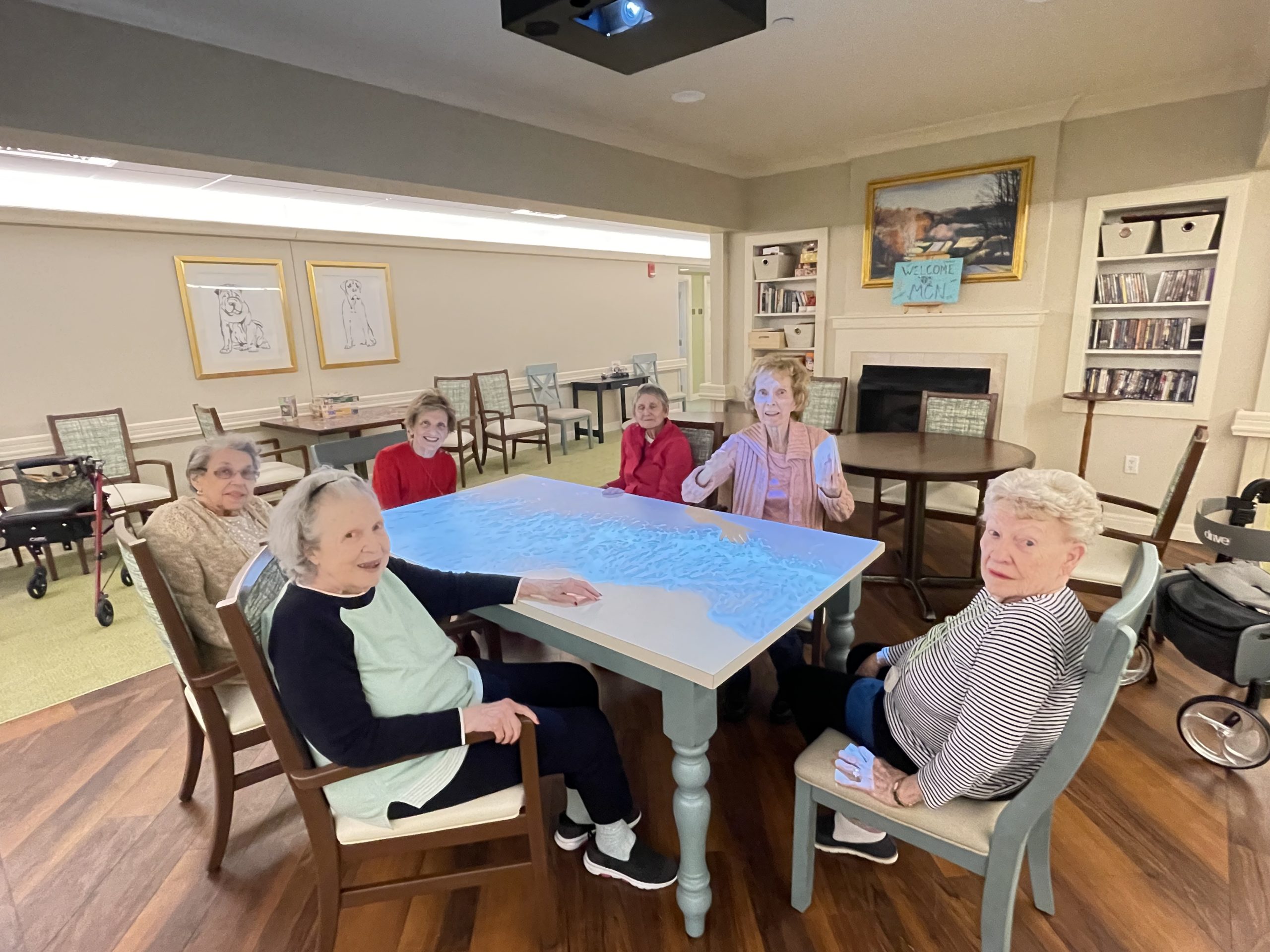 Magic tables provide stimulation for memory care residents - Senior Star